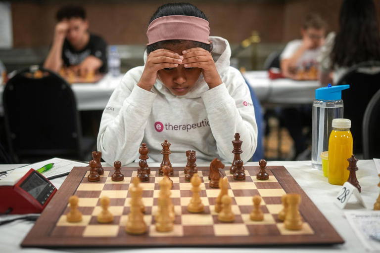 10-year-old becomes youngest female chess player to defeat grandmaster