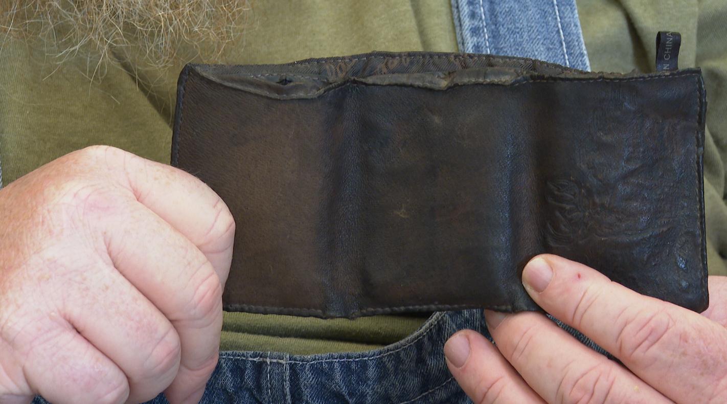 Missing wallet discovered under SUV’s hood connects retired Michigan ...