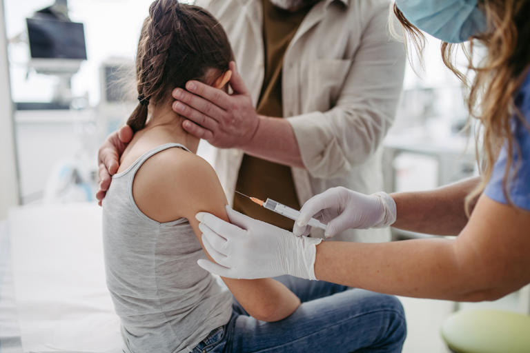 Hundreds of children hospitalised as flu cases soar in Queensland