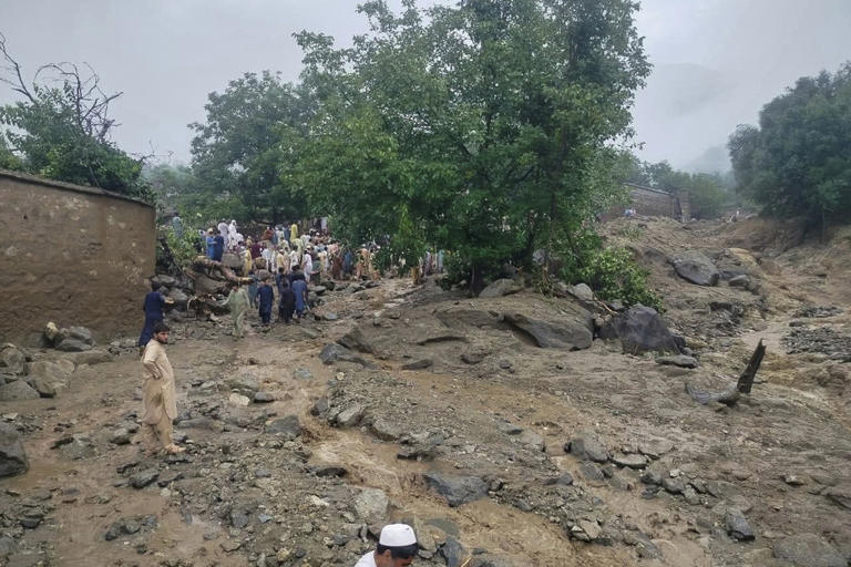 Flash floods triggered by heavy rains kill at least 49 people in ...