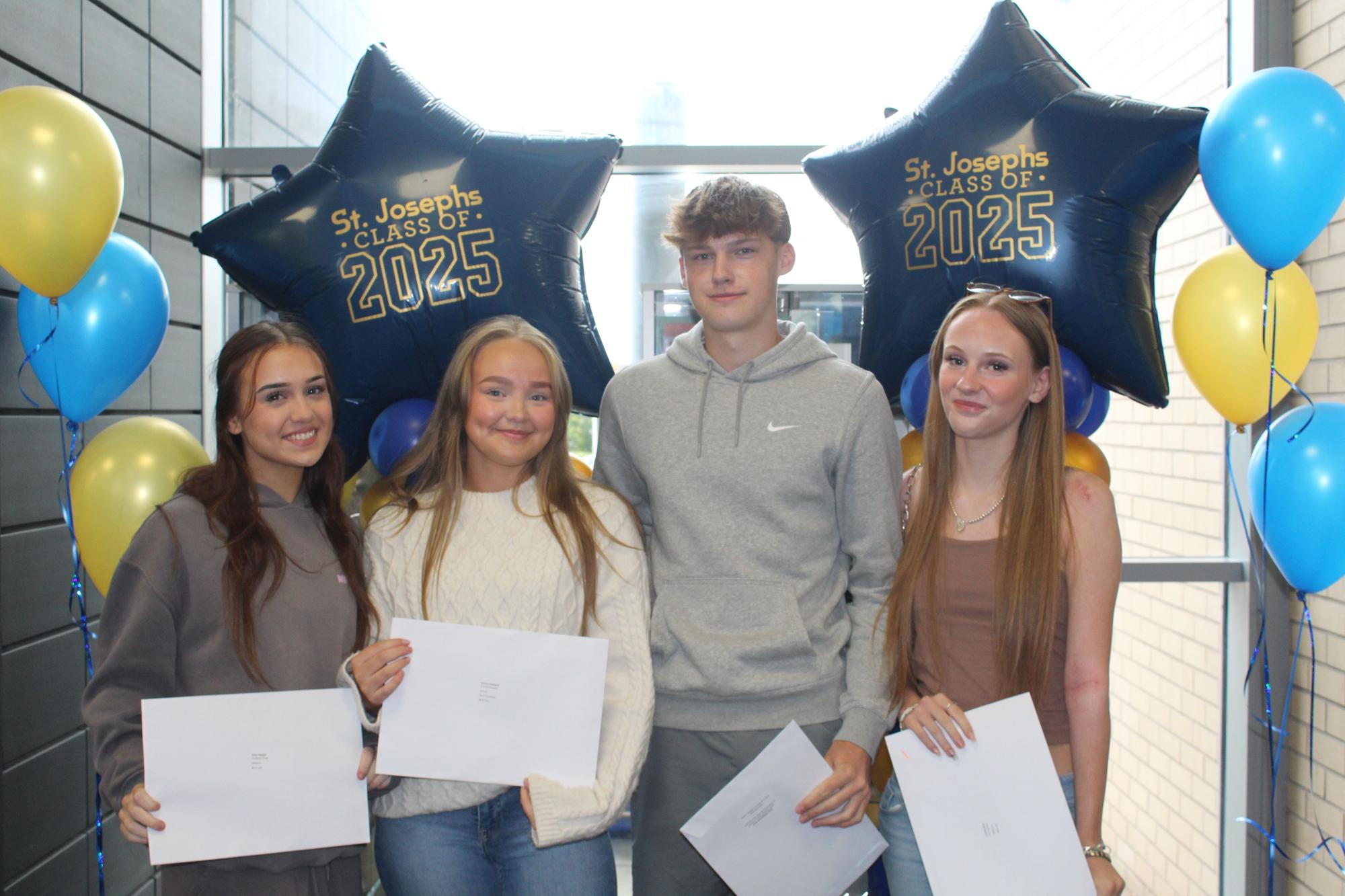 Excited GCSE students celebrate their results in Hebburn