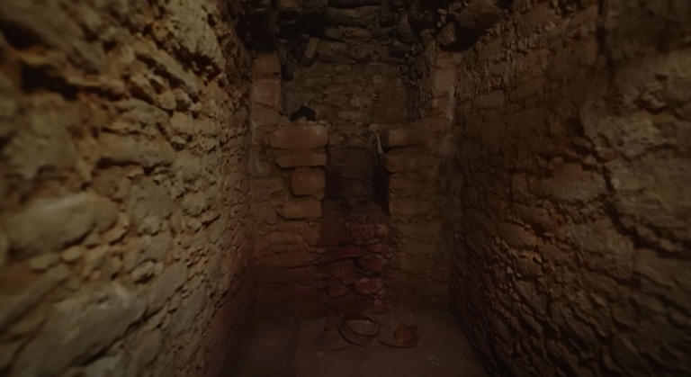 Archaeologists exploring in the shadow of an ancient Maya pyramid ...