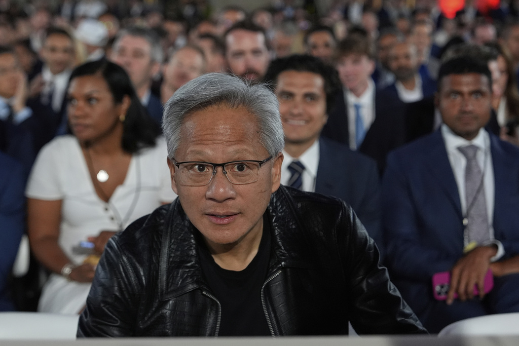 Nvidia's CEO says it's in talks with Trump administration on a new chip ...
