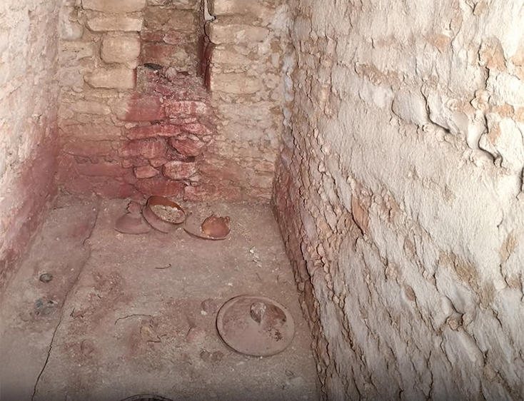 Archaeologists exploring in the shadow of an ancient Maya pyramid ...