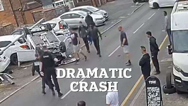 Car destroys lamppost and flips car after ploughing off road in crash