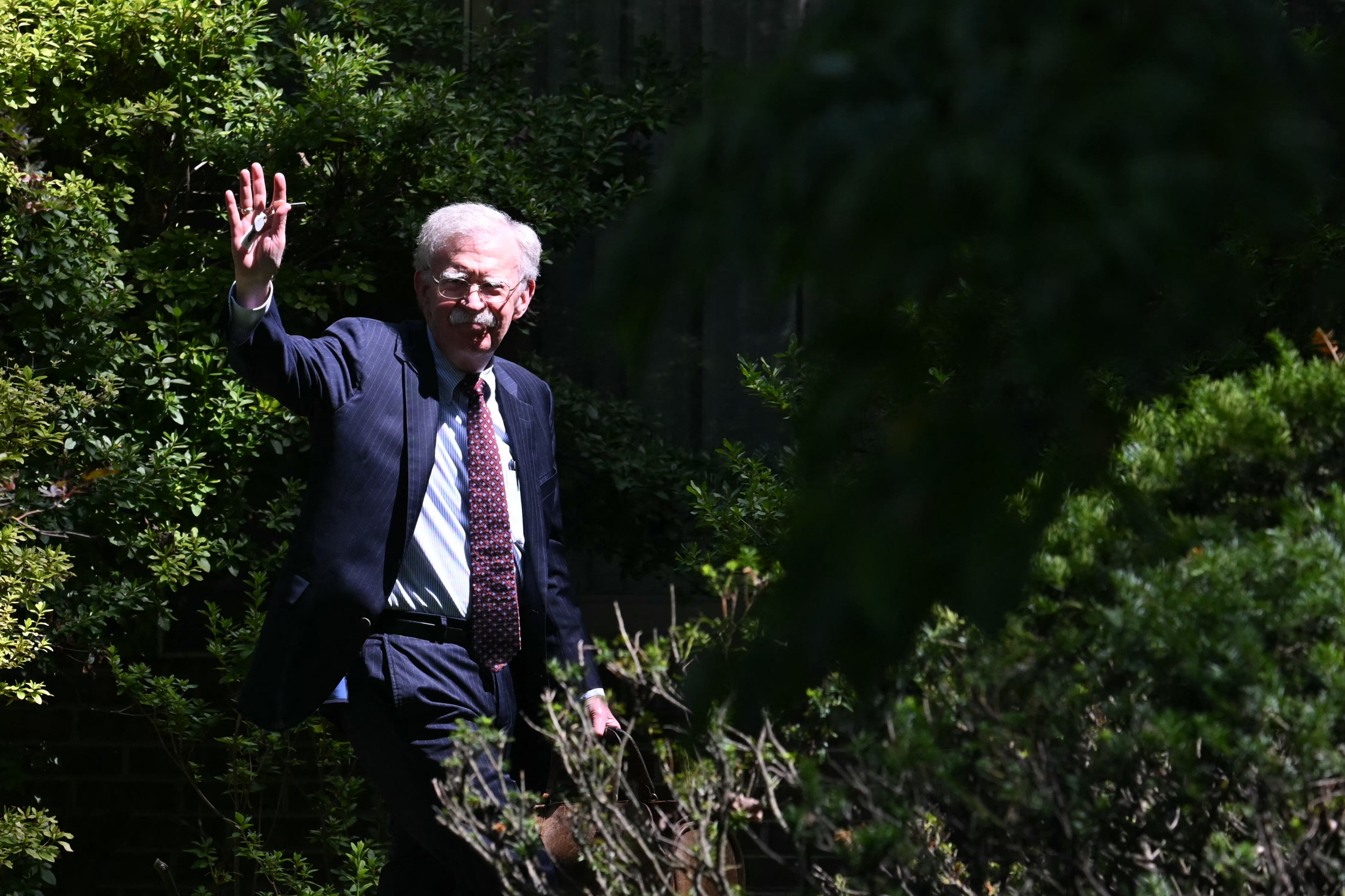FBI agents exit John Bolton's office with boxes in raid: Live updates