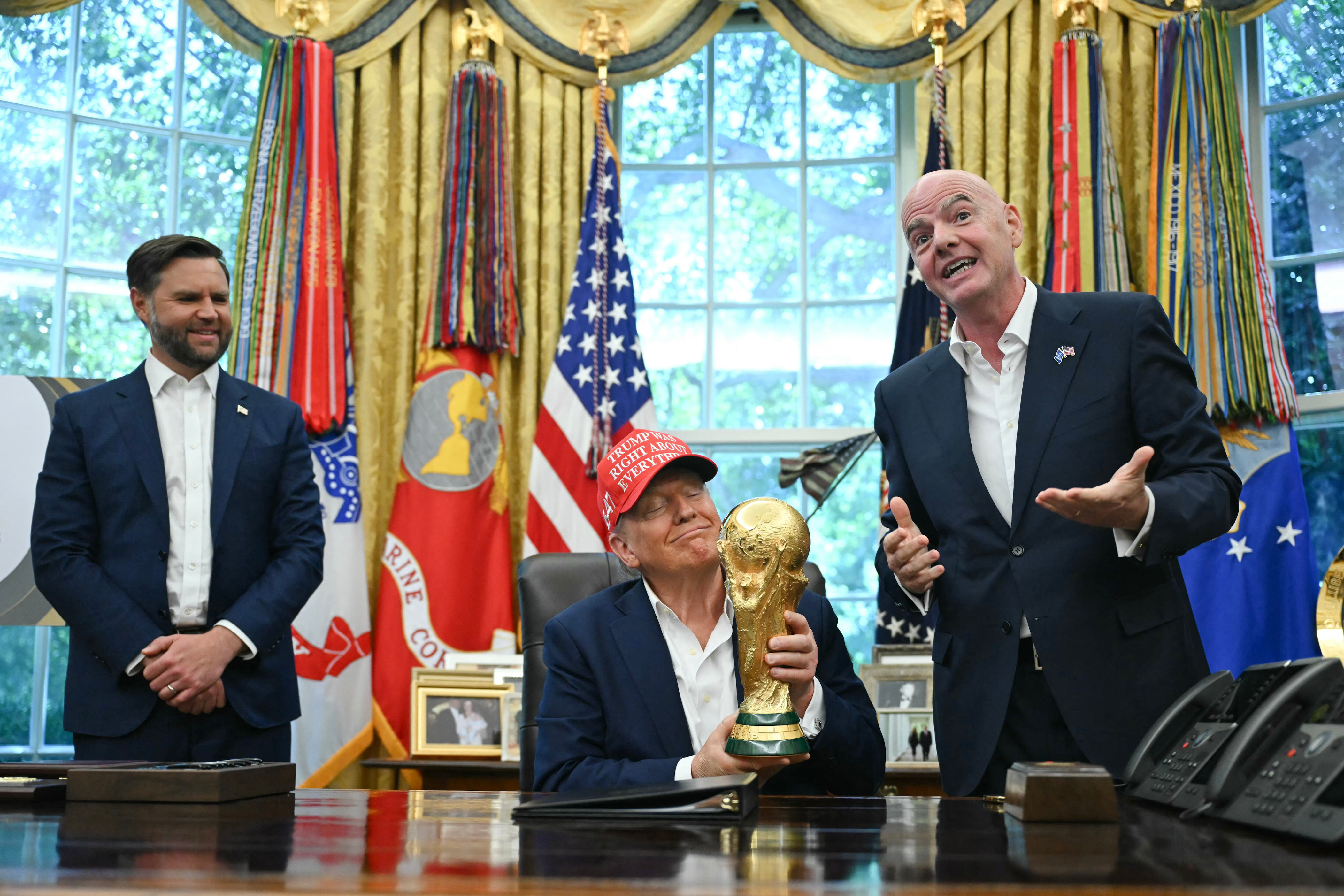 Trump Tries to Grab Solid Gold World Cup Trophy for Blinged-Up Oval