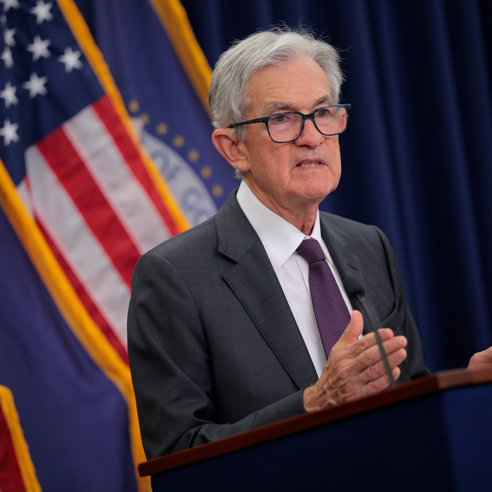 Dow surges more than 800 points after Fed's Powell hints at rate cut