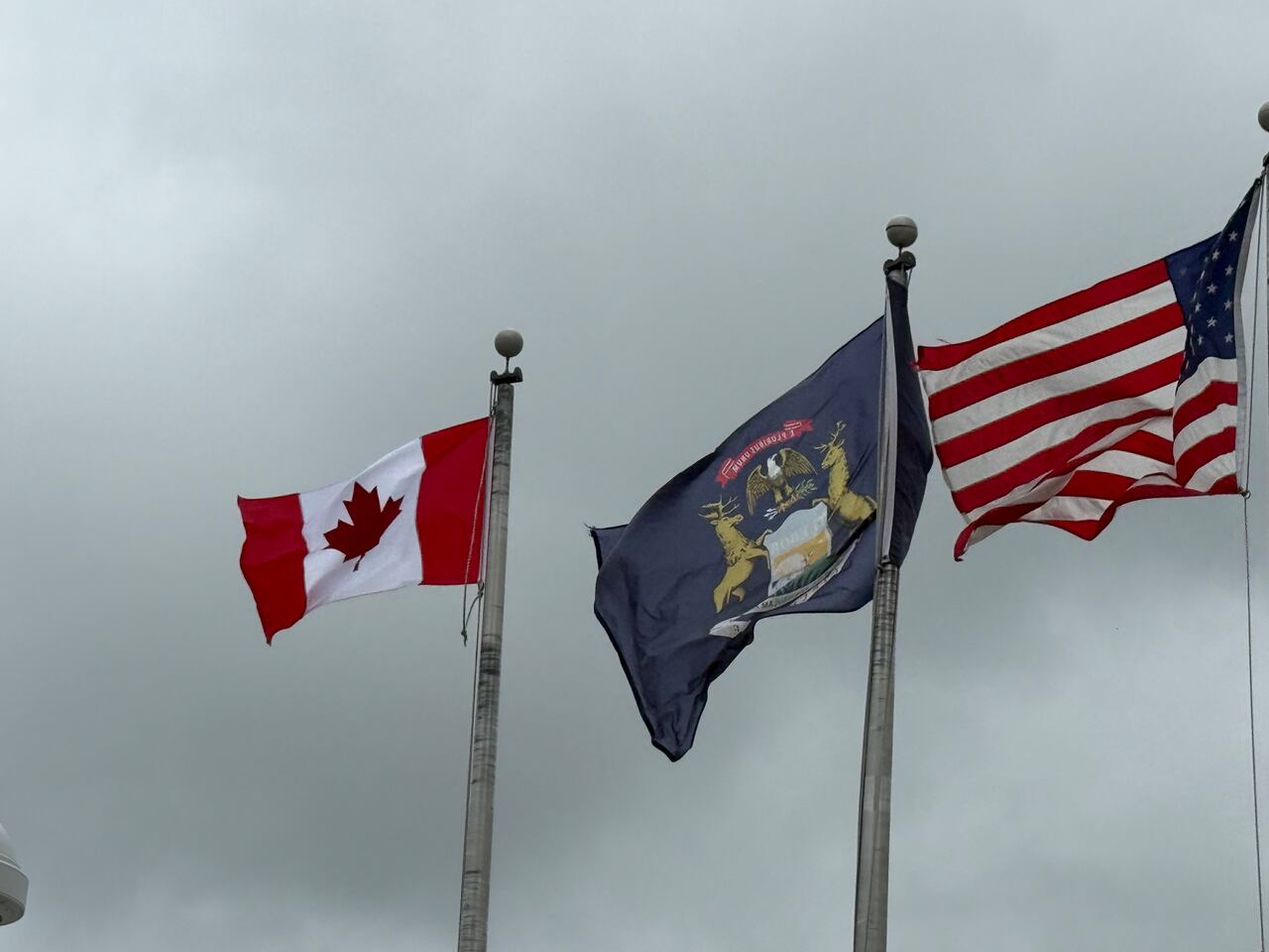 Why the Canadian flag is flying at city hall in a Michigan border city ...
