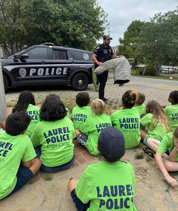 Kids having fun at Cops Camp with Laurel police officers