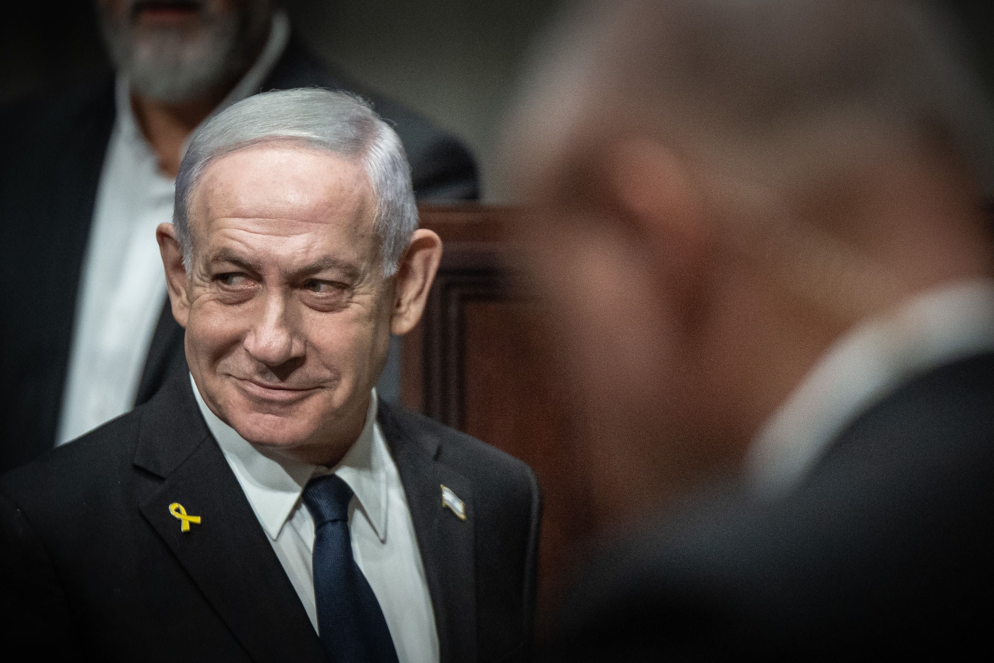 Netanyahu knows gov't survival hinges on Gaza invasion, IDF source says