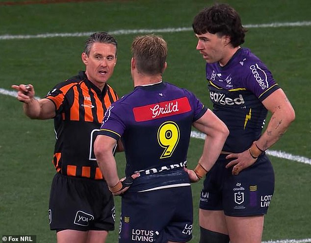 Footy fans stunned after bizarre penalty for 'head rub' as Melbourne ...