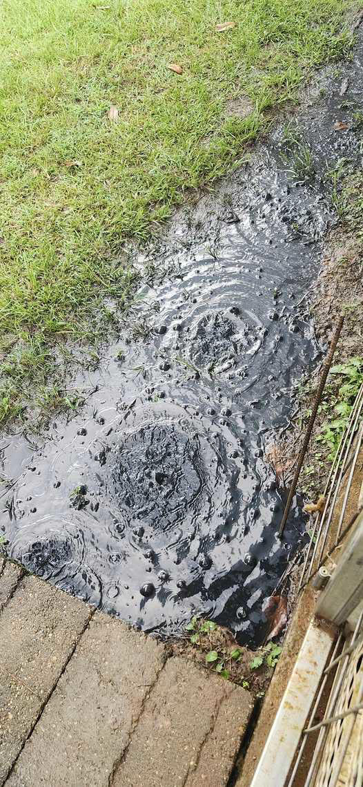 PHOTOS: Oily sheen seen on homes, cars in Roseland after explosion