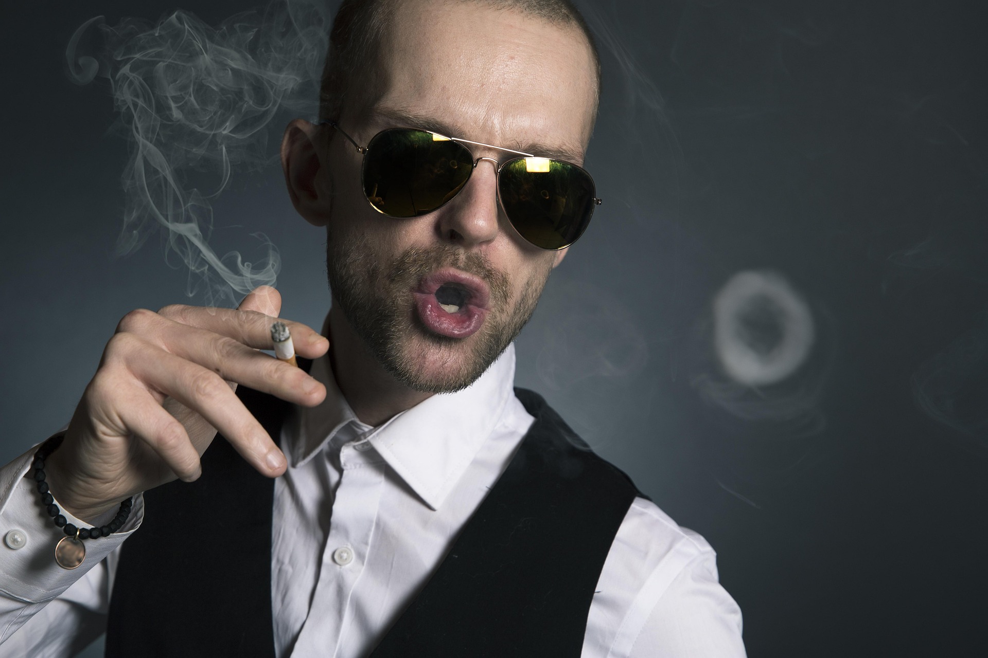 Blowing perfect cigar smoke rings takes skill — here’s how to master it