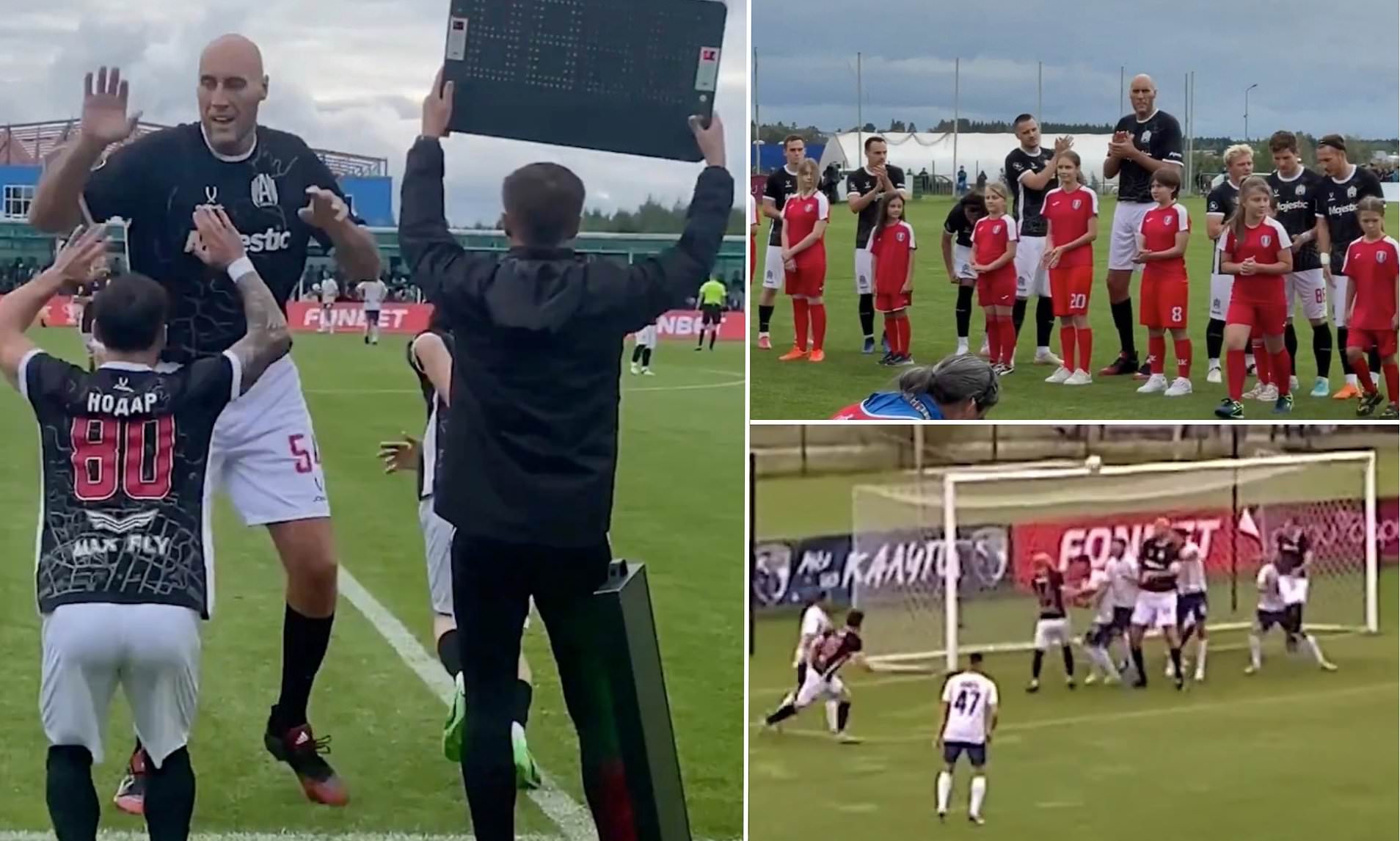 Meet the TALLEST footballer - nearly a foot bigger than Peter Crouch ...