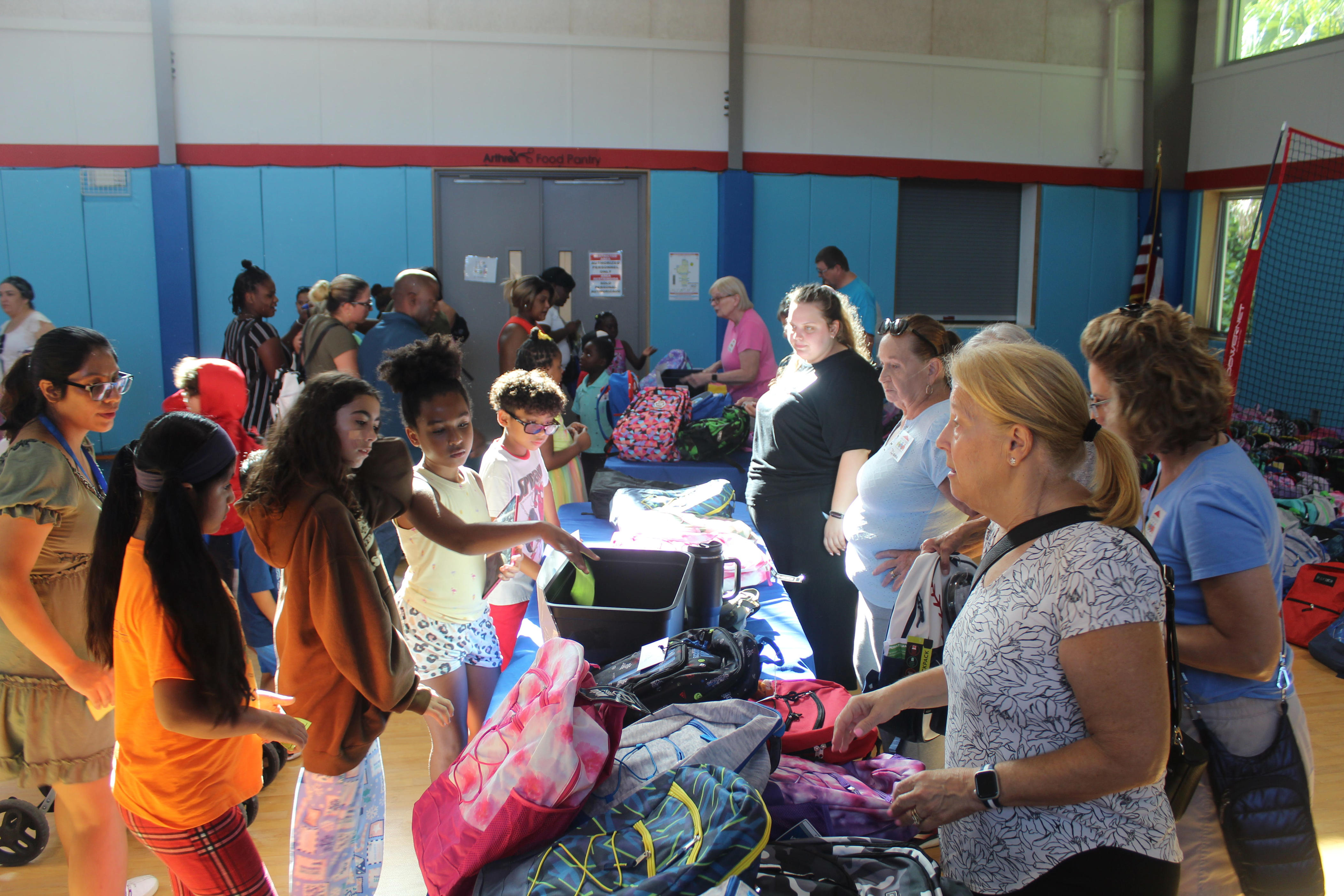 Grace Place gives 940 backpacks at Back to School Bash