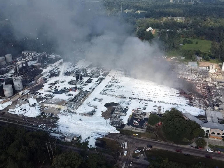 Mandatory evacuation still in place as plant explosion continues to burn