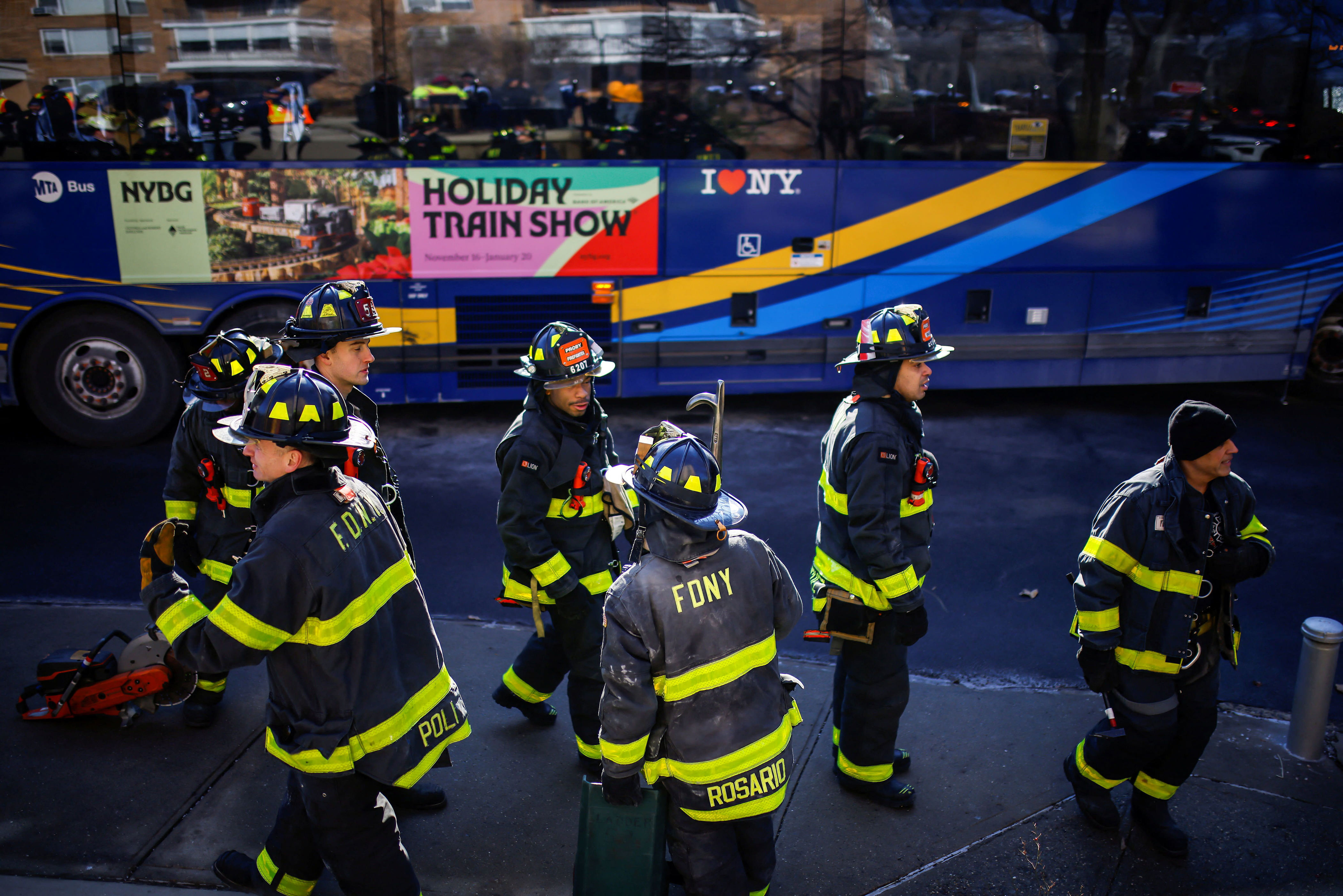 Tour bus rolls over on New York highway, killing five and injuring dozens
