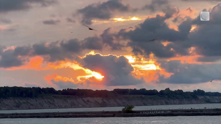 A beautiful yet cloudy sunrise over Lake Erie