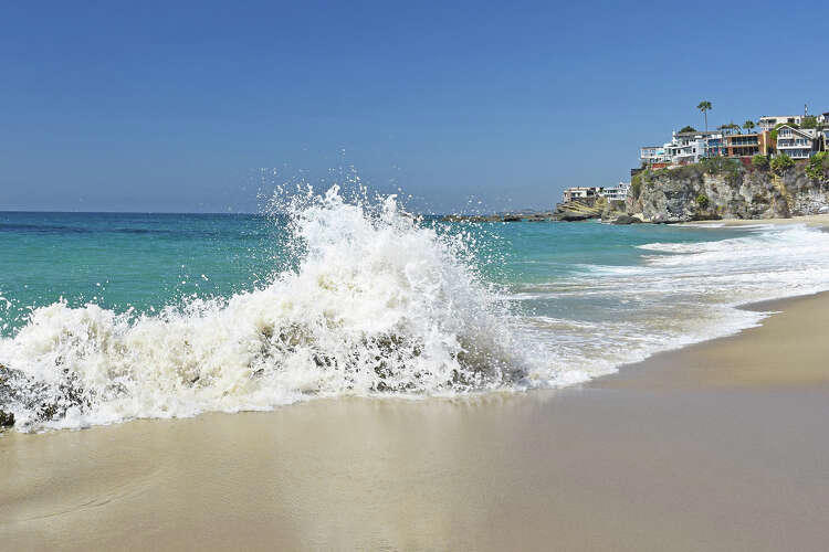 Guard in folding chair once shooed people away from this Calif. beach