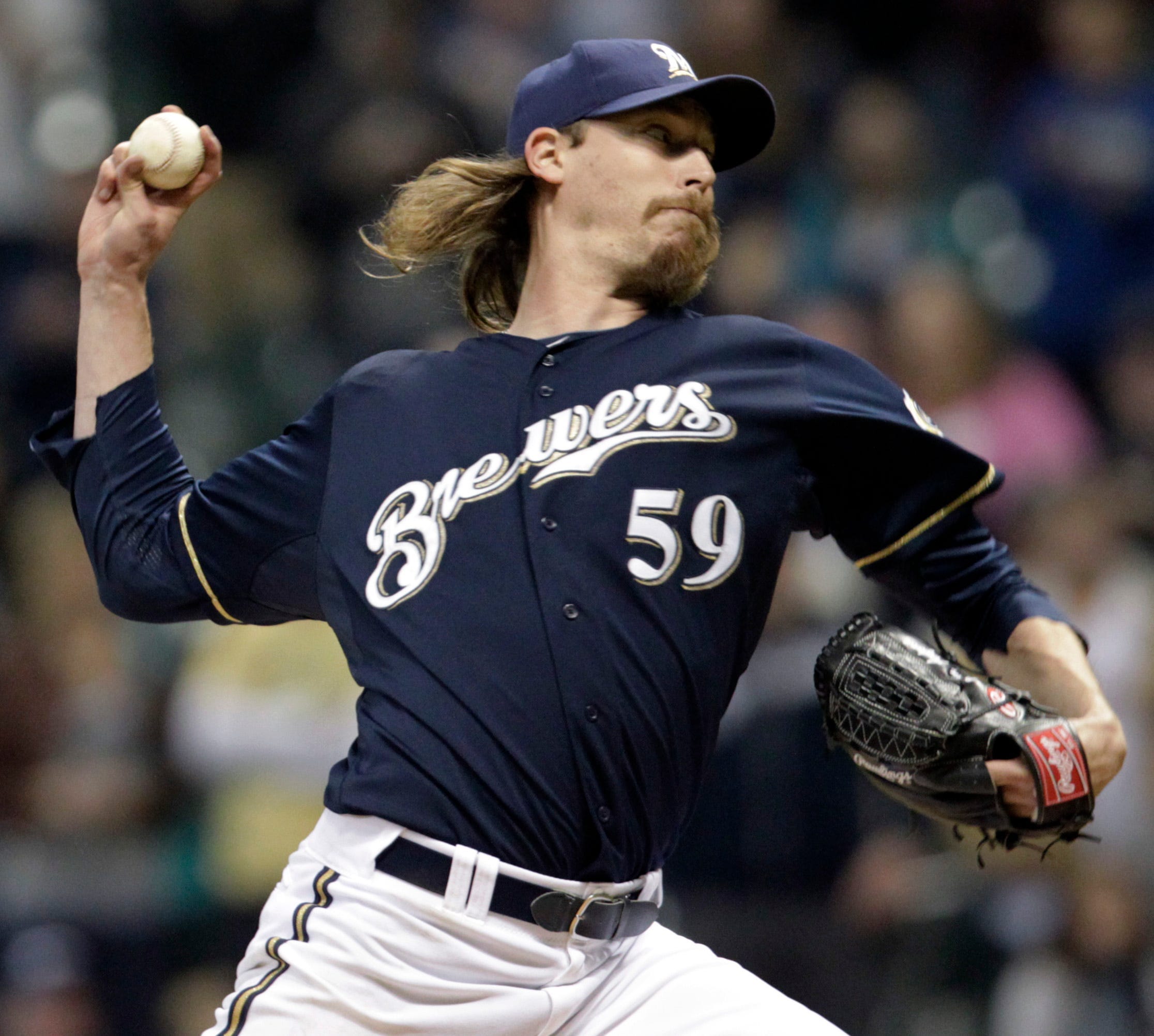 Even on his special day, John Axford tips his cap to Bob Uecker