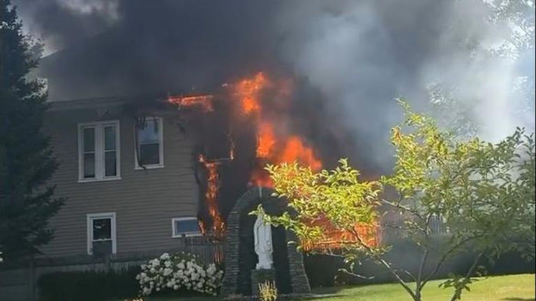 10 displaced following house fire in Woonsocket