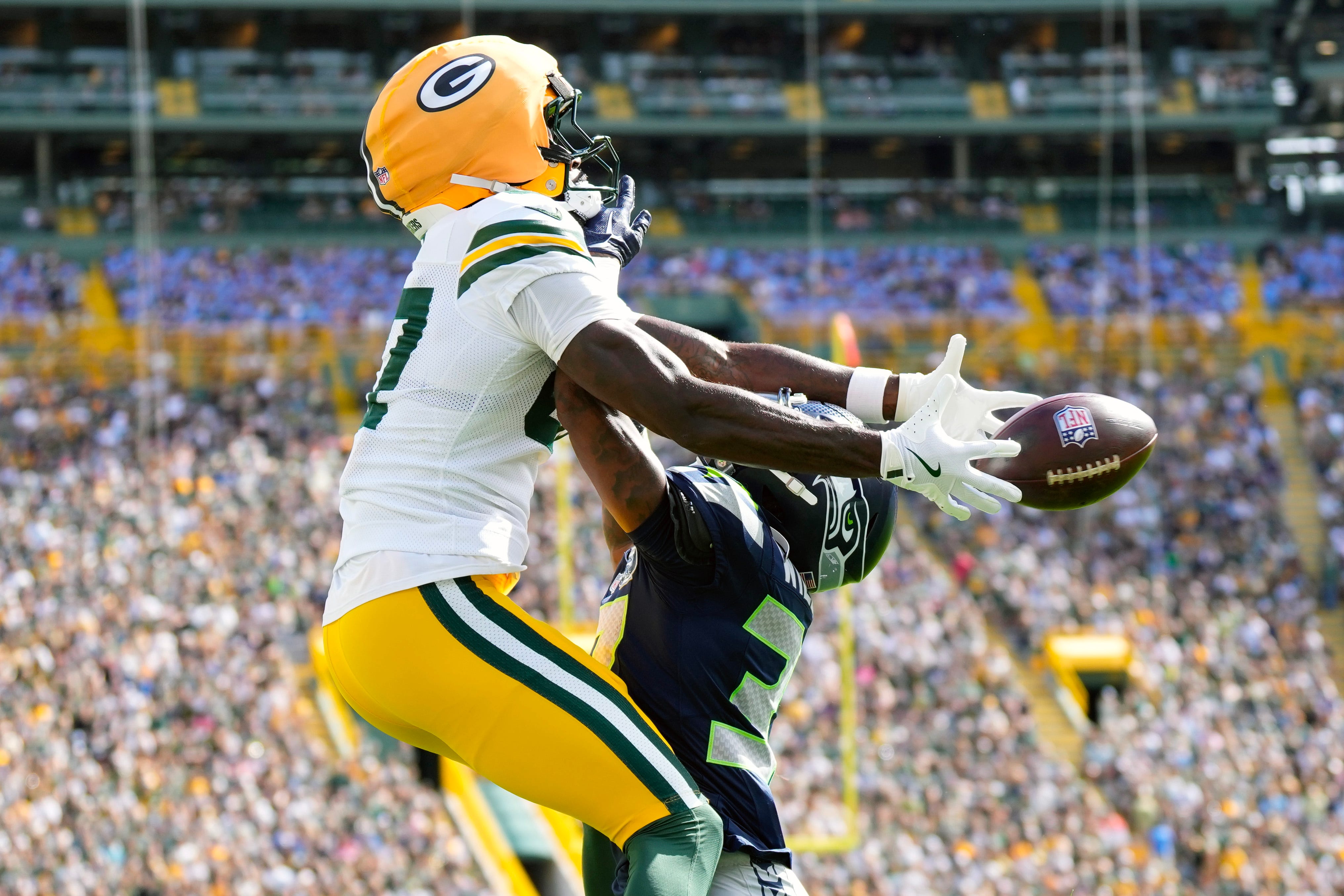 Why is Packers wide receiver Romeo Doubs wearing a helmet cover? Here's ...