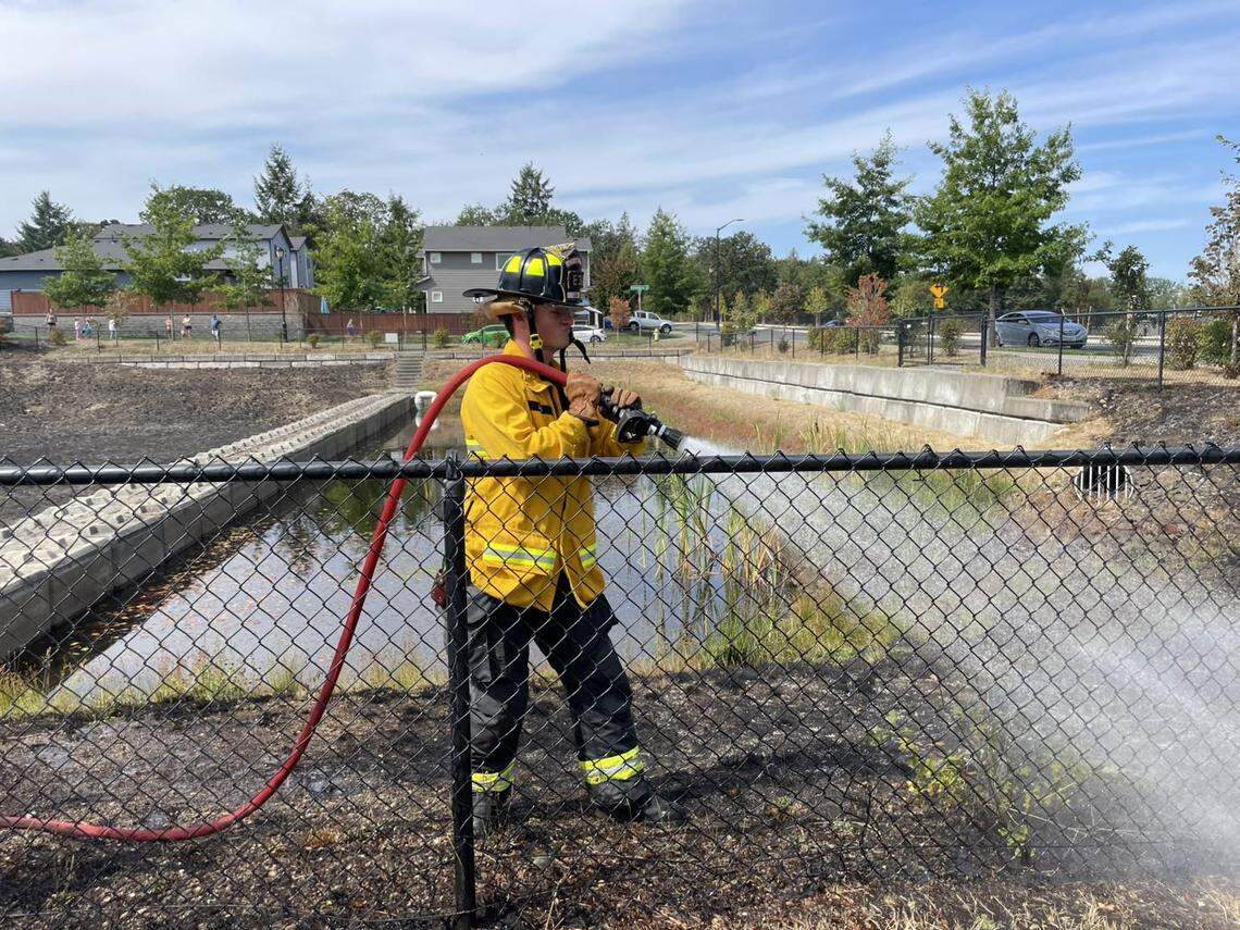 Lacey fire crews respond to blaze near homes. Find kids with lighter