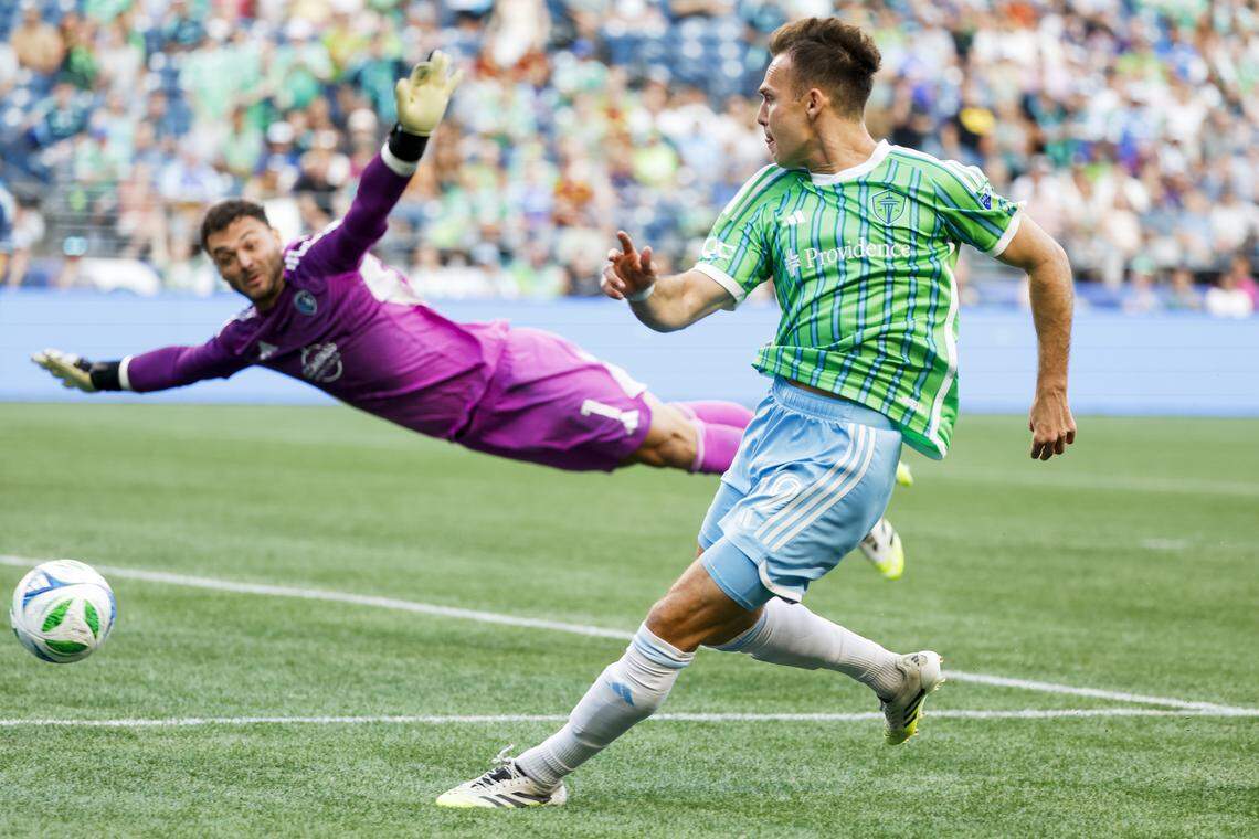 Seattle Sounders record hat trick, send Sporting KC packing with ...