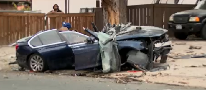 Car hits tree after 2-vehicle crash in Aurora