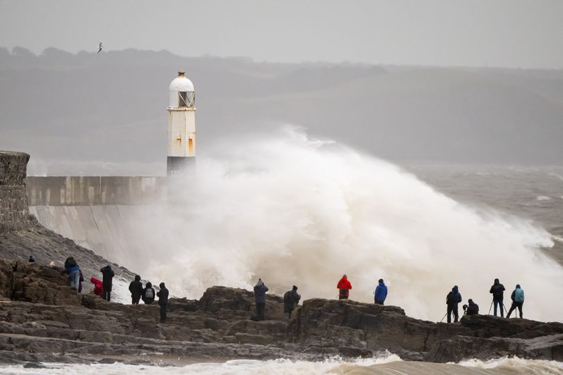Warning after huge waves knock people into boulders at popular seaside ...