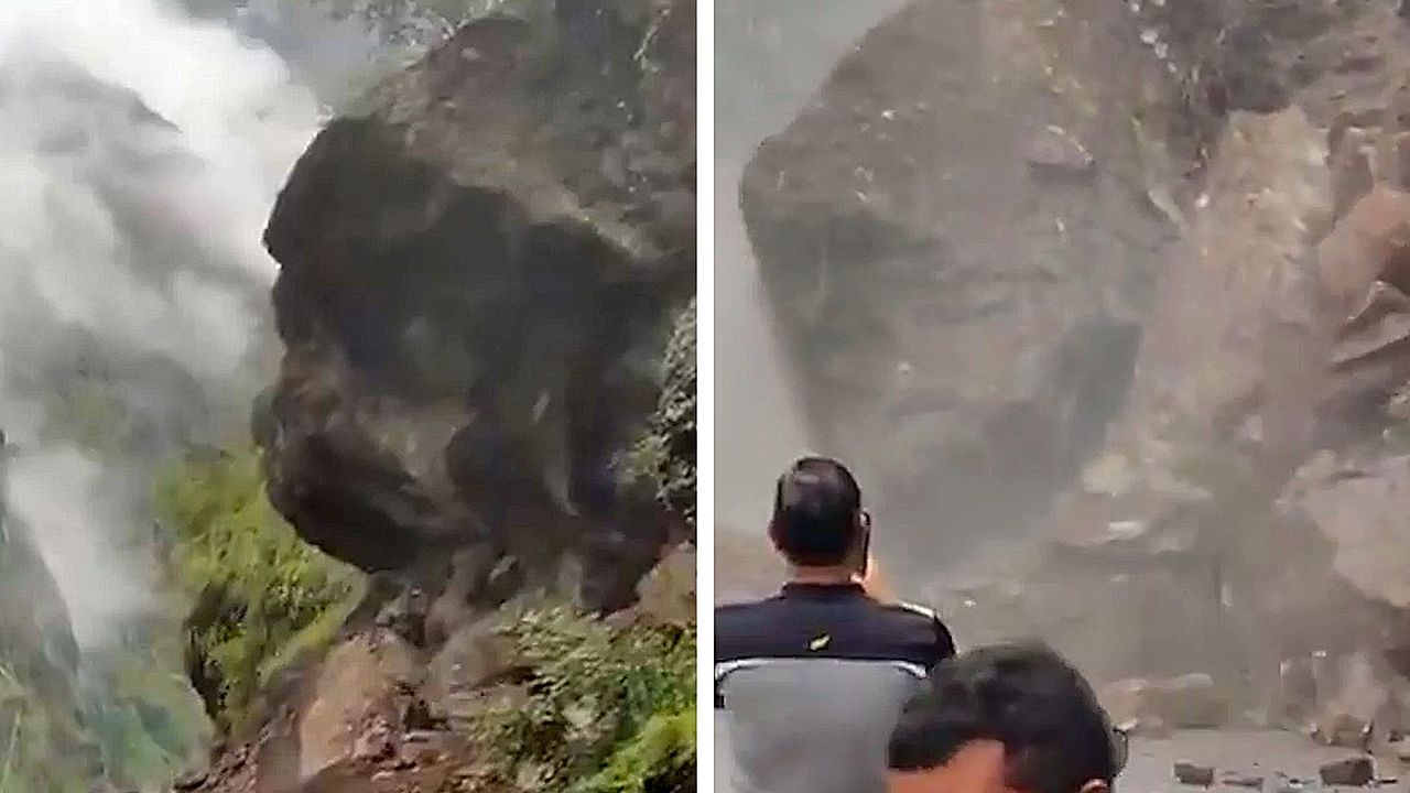 Gigantic boulder crashes onto road as rain triggers massive landslides ...