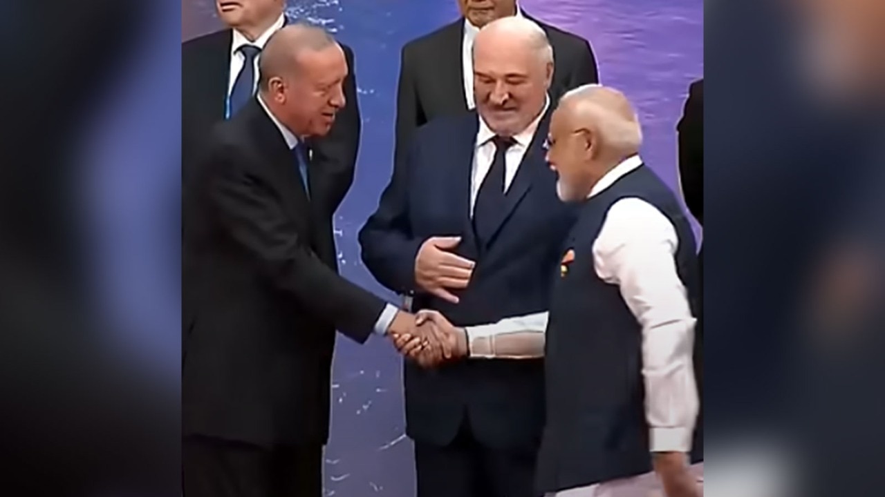 Handshake and a pat: PM meets Turkey's Erdogan amid strained ties after ...