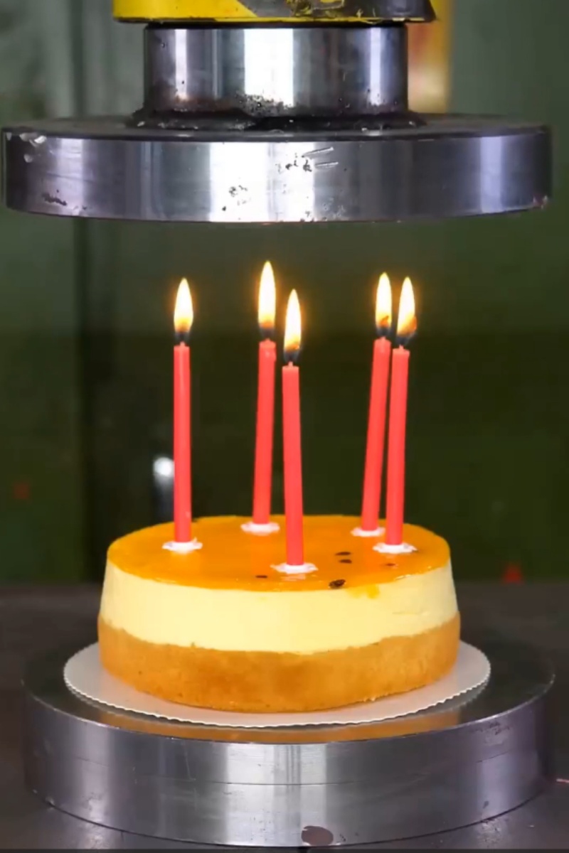 Birthday cake vs hydraulic press