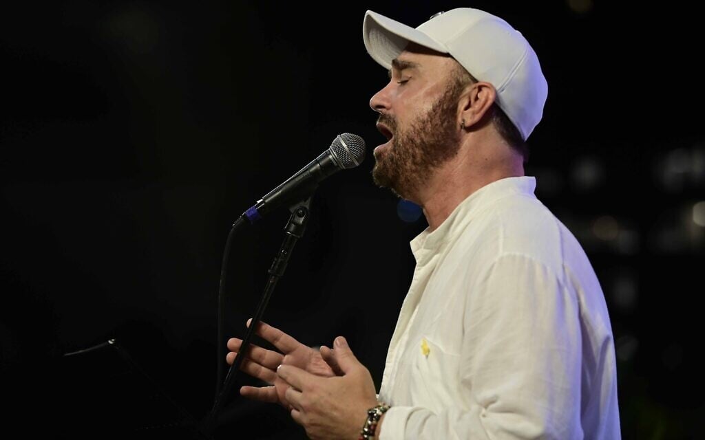 Pro-Palestinian activist throws red paint on Israeli singer at concert ...