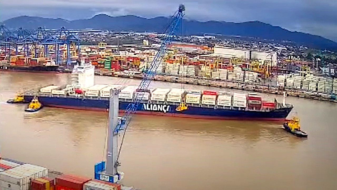 Tugboats race to stop runaway cargo ship that broke loose in Brazilian port