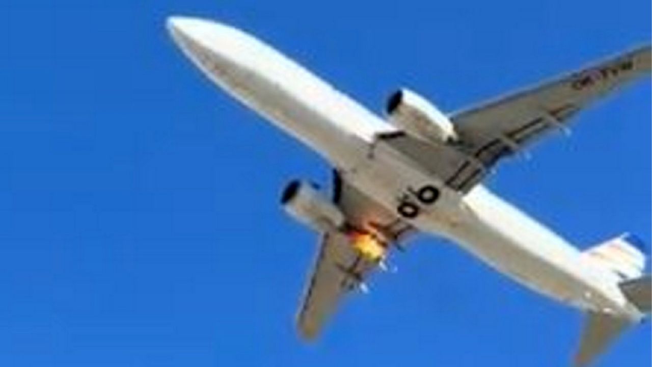 Dramatic moment plane's engine shoots out flames seconds after take-off