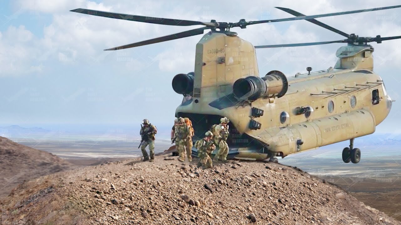 US CH-47 helicopter conducts challenging troop insertion atop mountain peak