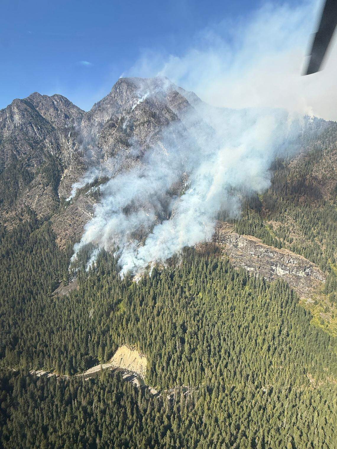 Eastern Whatcom County wildfire growing quickly, structures threatened