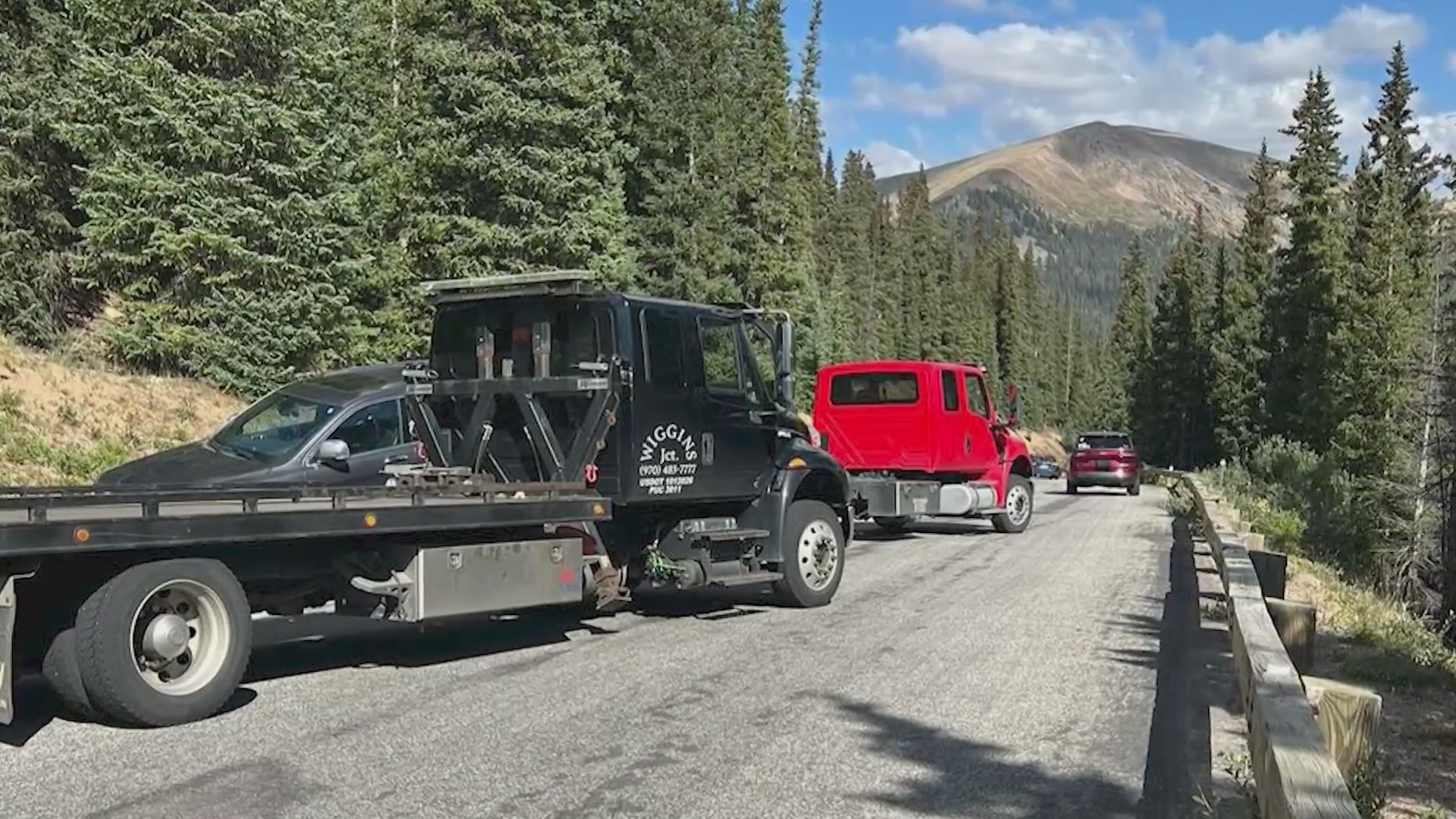 Why did so many people's cars get towed on Guanella Pass over the weekend?