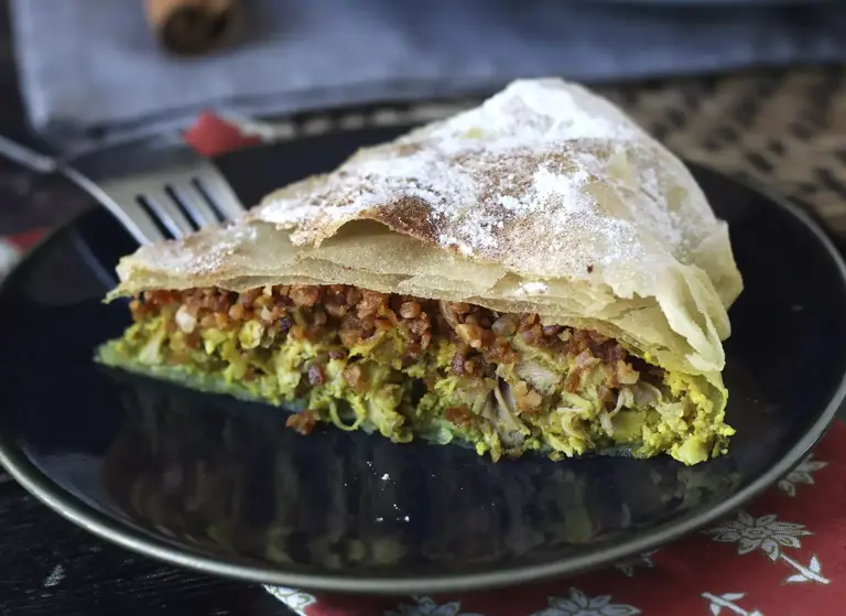 Traditional Moroccan pastilla with phyllo dough, chicken and spices