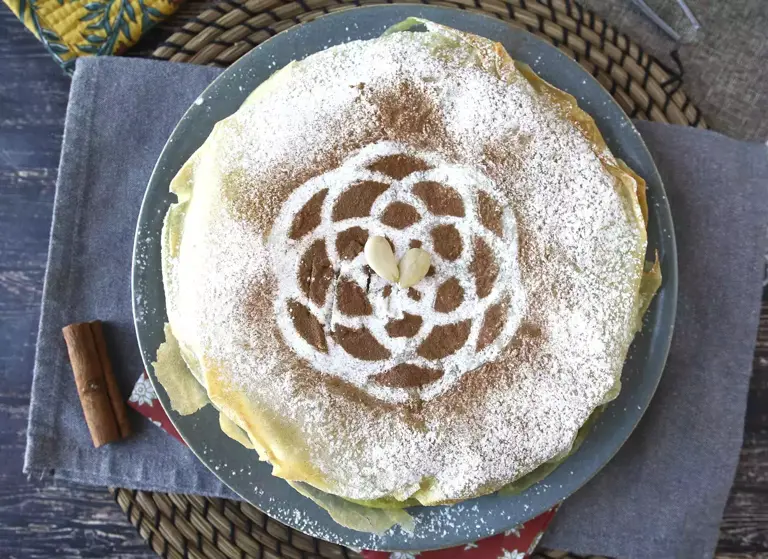 Traditional Moroccan pastilla with phyllo dough, chicken and spices