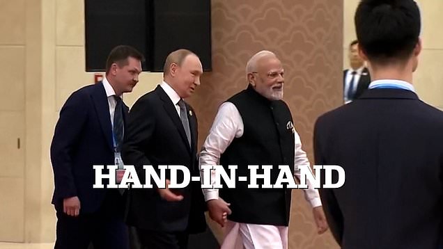 Putin and Modi hold hands at China's anti-Nato summit