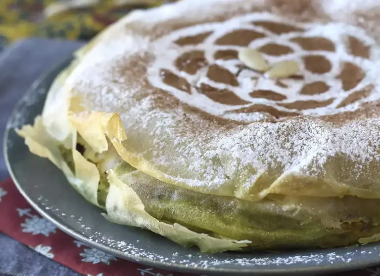 Traditional Moroccan pastilla with phyllo dough, chicken and spices