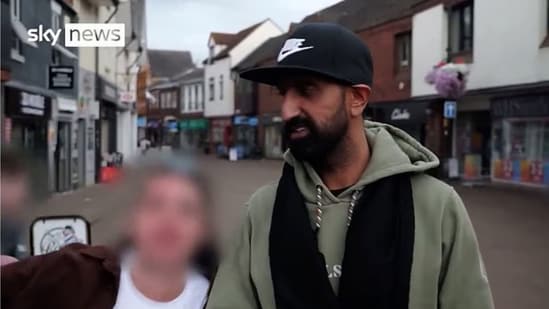 Sky News reporter shields businessman who faced racial abuse during ...