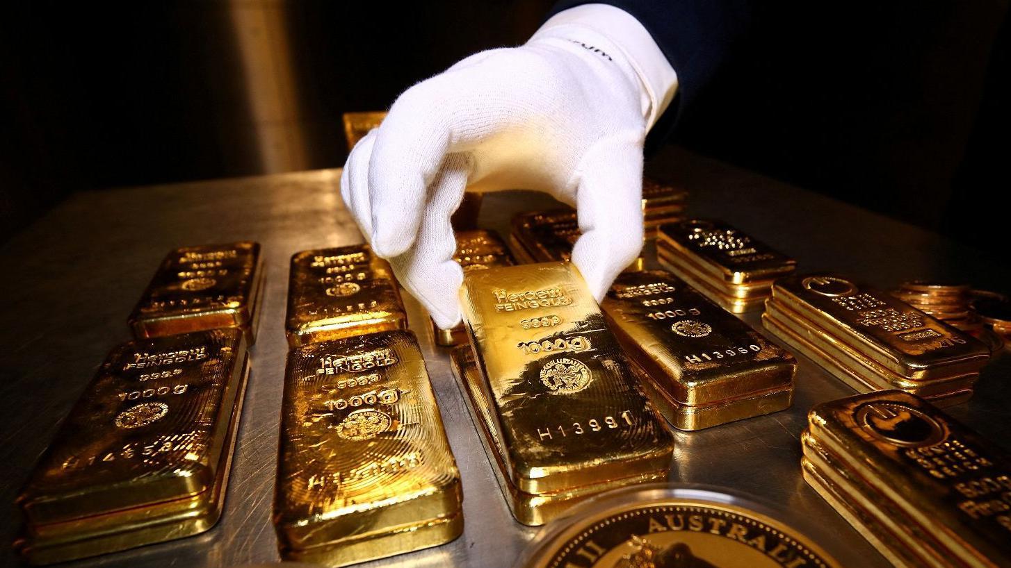 Gold price hits record high as investors seek safety