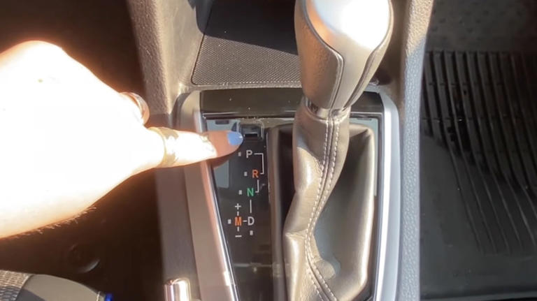 What Is The Little Button Next To Your Car's Gear Shift For?