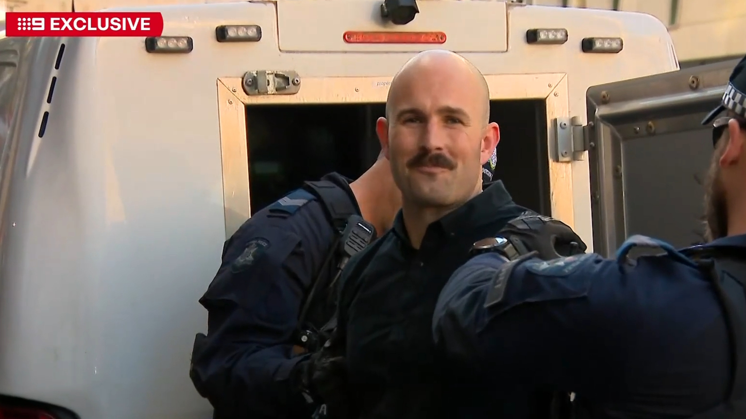 Neo-Nazi charged hours after crashing media conference