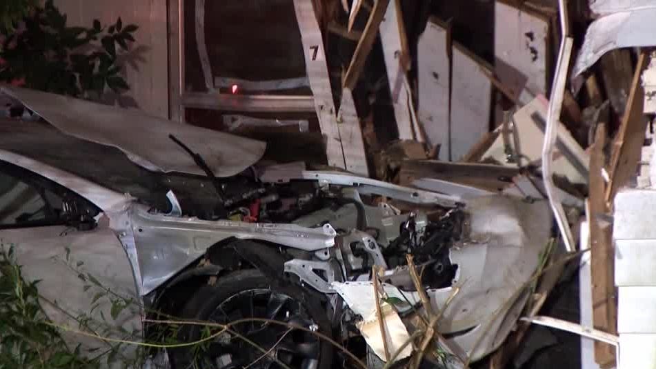 Car crashes into home on Island Pond Road in Manchester