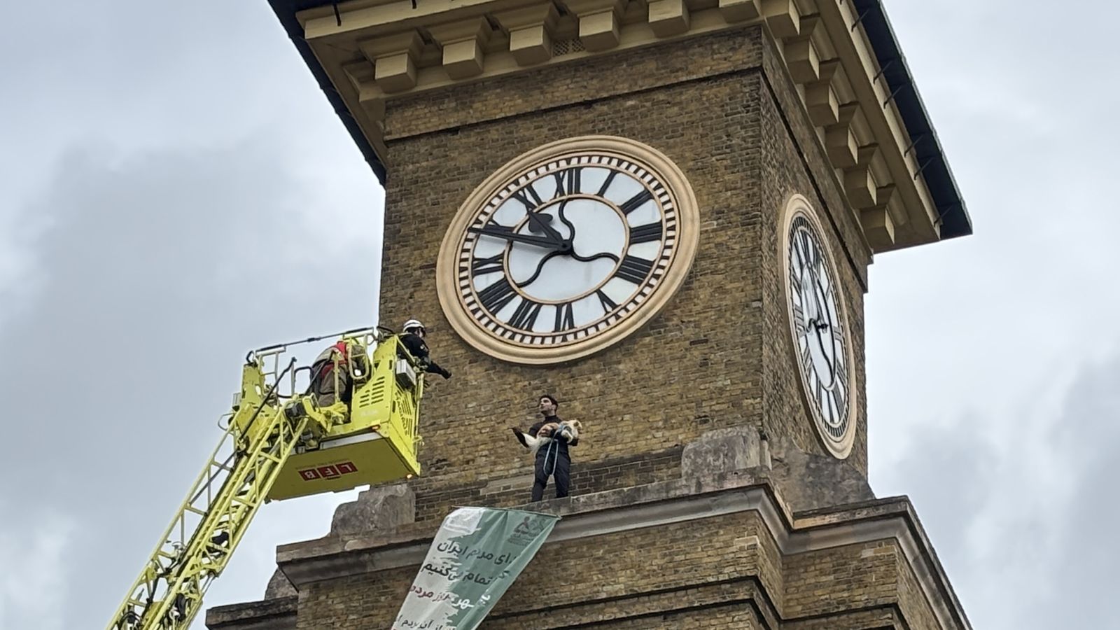 Protester arrested after climbing London clock tower while clutching a dog